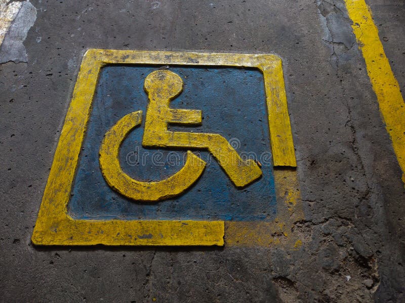 Physical Disability Sign on the Ground Stock Photo - Image of texture ...
