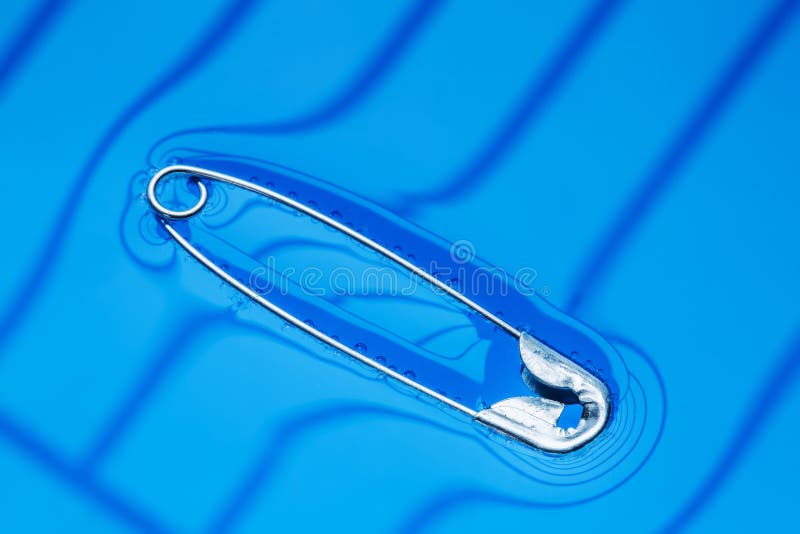 Physical Experiment - Pin Floating on Water Surface Stock Image - Image ...