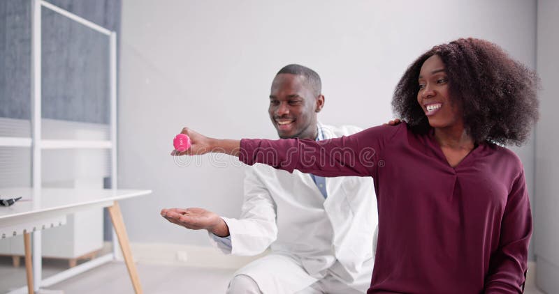 Physical Rehabilitation Therapist Helping Man Stock Image - Image of ...