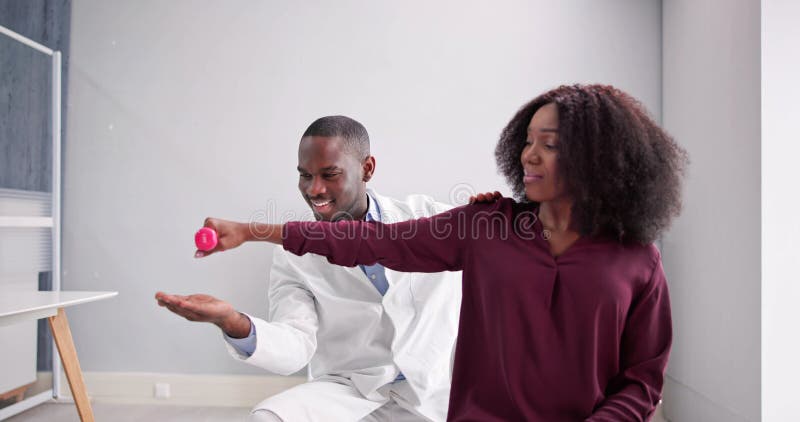 Physical Rehabilitation Therapist Helping Man Stock Image - Image of ...