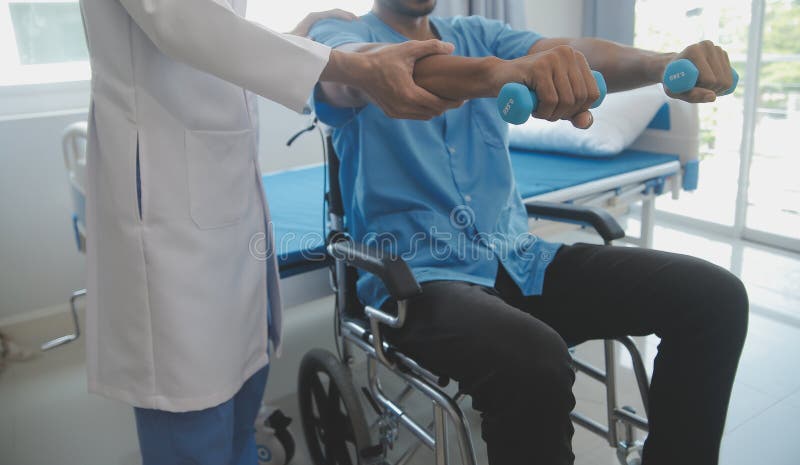 Physical Therapist Guiding Patient with Resistance Band Stock Photo ...