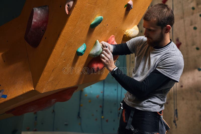 Physically Challenged Boulderer Fixing Artificial Rocks and Holds at ...