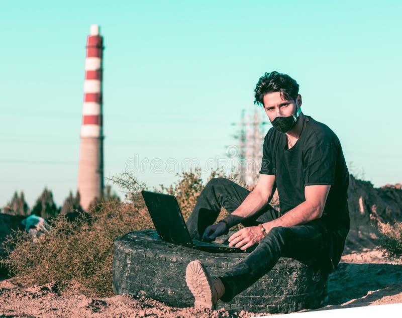 A Physically Distant and Socially Connected Young Man in a Black Outfit ...