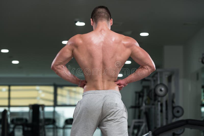Physically Man Showing His Well Trained Back Stock Photo - Image of ...