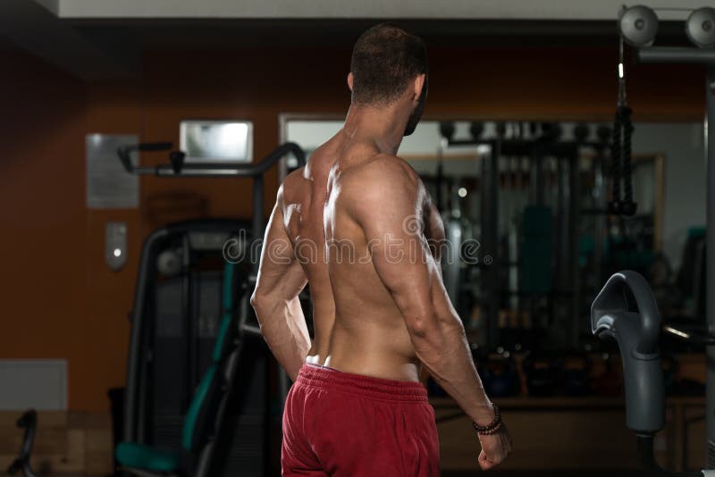 Physically Man Showing His Well Trained Back Stock Photo - Image of ...
