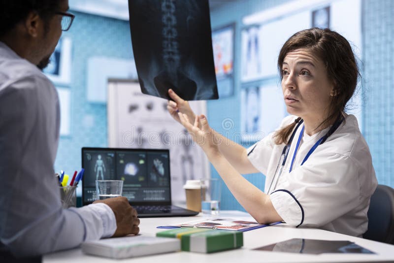 Physician Presenting X Ray Imaging for the Right Diagnostic during ...