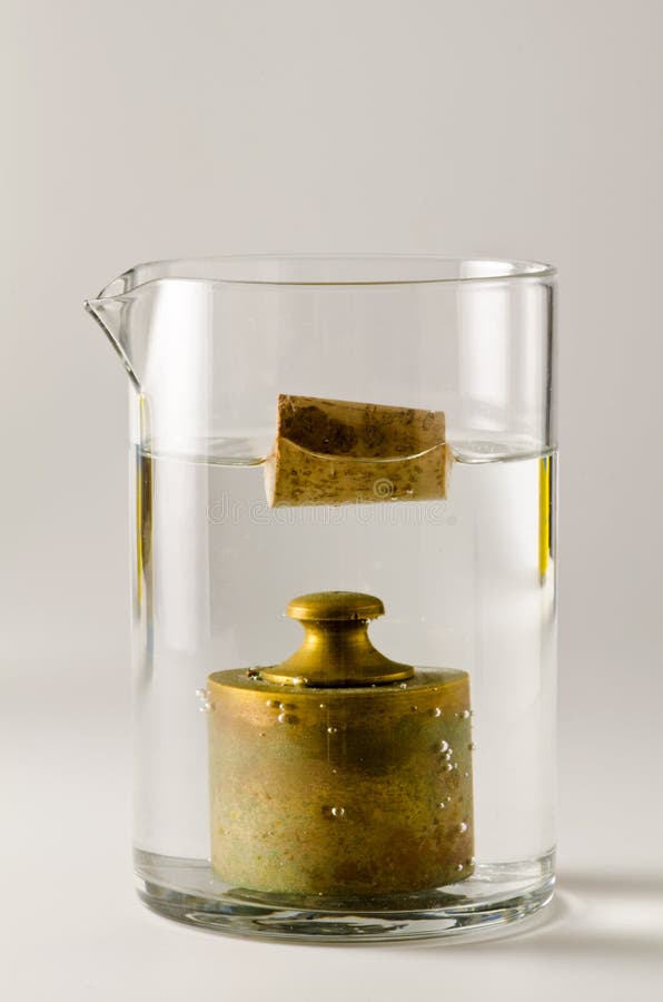 Physics. Heavy and Light Objects in Water. Stock Image - Image of ...