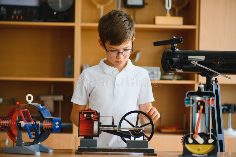 Physics Lesson. a Student at a Desk with Scientific Instruments and a ...