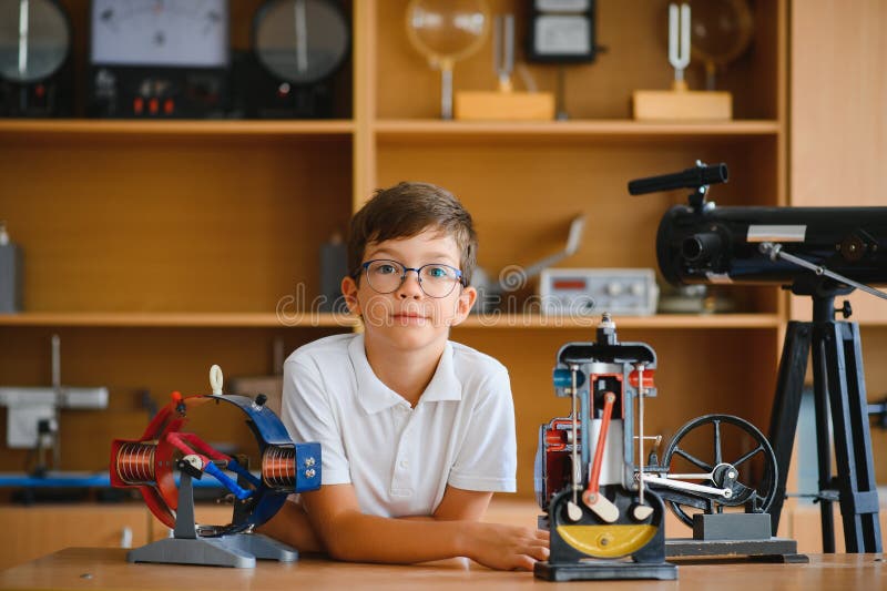Physics Lesson. a Student at a Desk with Scientific Instruments and a ...