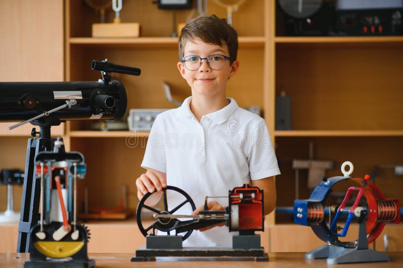 Physics Lesson. a Student at a Desk with Scientific Instruments and a ...