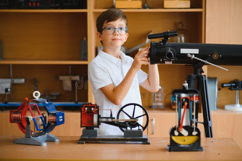 Physics Lesson. a Student at a Desk with Scientific Instruments and a ...