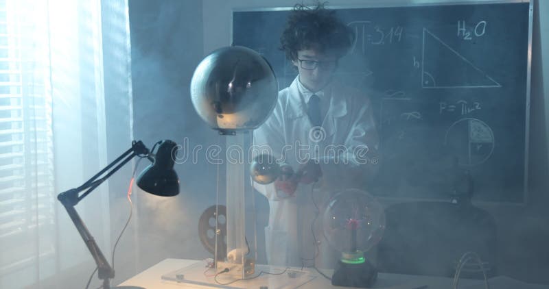 Physics Science Lab: Handsome Young Scientist in White Coat and Glasses ...