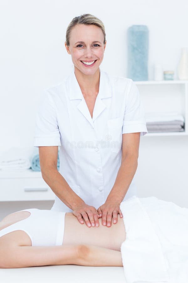 Physiotherapist Doing Back Massage Stock Photo - Image of patient ...