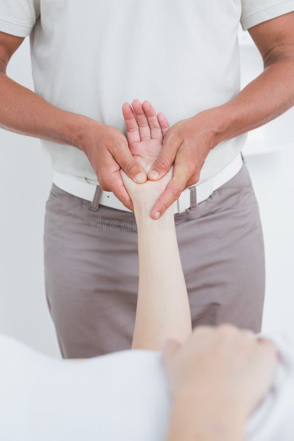 Physiotherapist Doing Hand Massage Stock Photo - Image of examining ...