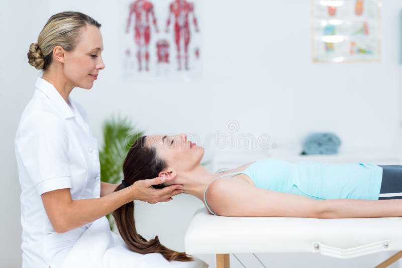 Physiotherapist Doing Neck Massage Stock Photo - Image of checking ...