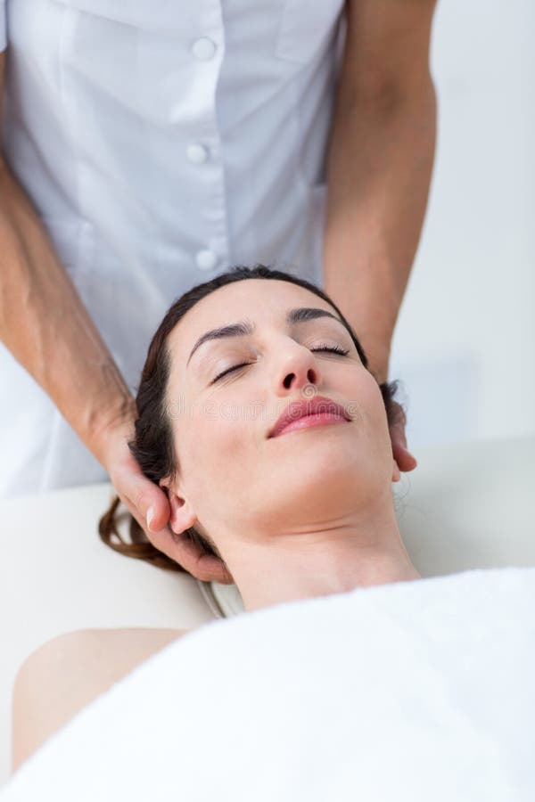 Physiotherapist Doing Neck Massage Stock Image - Image of indoors ...