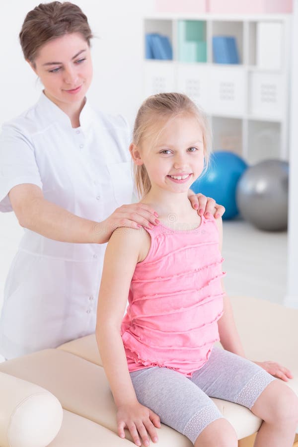 Physiotherapy can be fun! stock image. Image of examination - 78377169