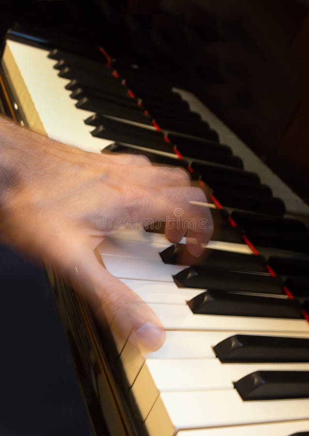 Pianist Hand Playing a Chord, Motion Action. Stock Image - Image of ...