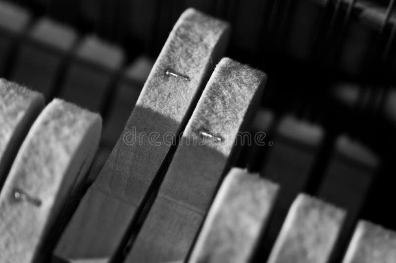 Piano hammers striking stock photo. Image of activated - 99476676