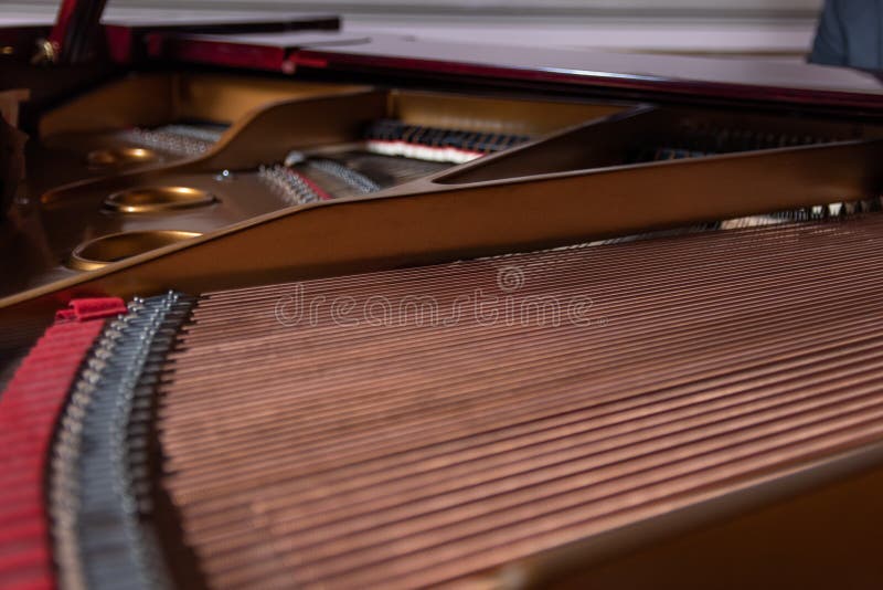 A Piano with a Harp Stands in the Corner of a Luxury Room with Vintage ...