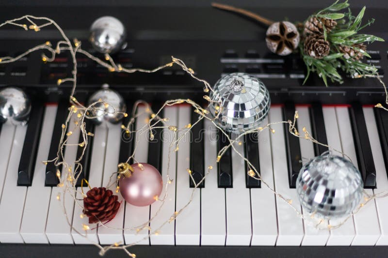 Piano Keyboard with Christmas Decoration, Closeup. Stock Photo - Image ...
