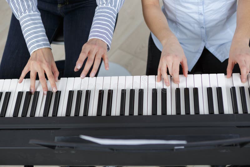 Piano Keyboard Top View and Hands Two Players Stock Photo - Image of ...