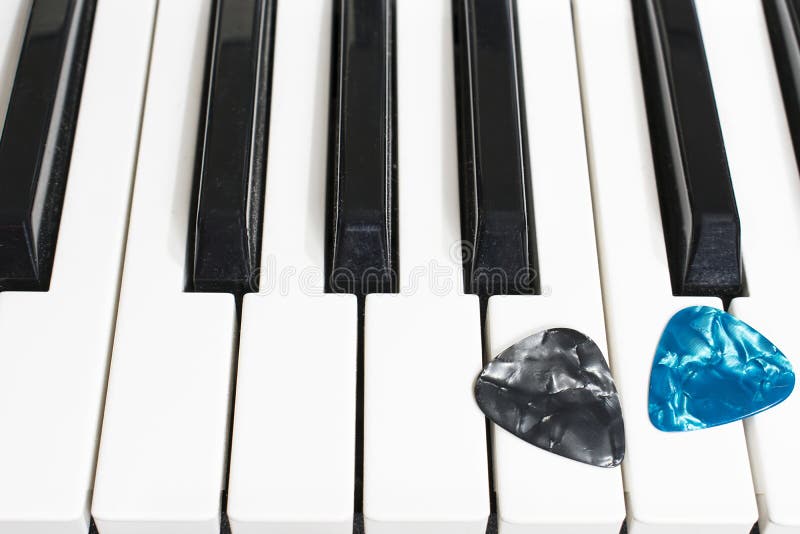 Piano Keys and Guitar Picks. Stock Photo - Image of instrumental, organ ...
