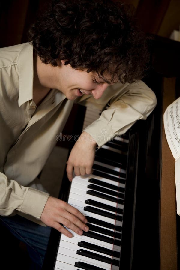 Man playing piano stock photo. Image of person, play - 14246140