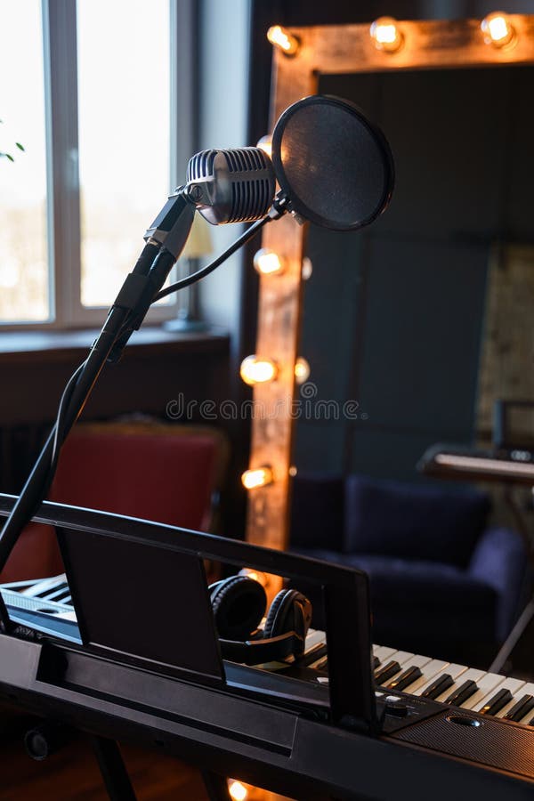 Piano, Microphone and Mirror in an Empty Studio Stock Photo - Image of ...