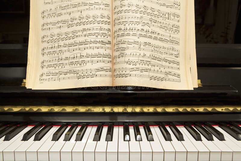 Piano with Music Book stock image. Image of musical, keyboard - 13455609