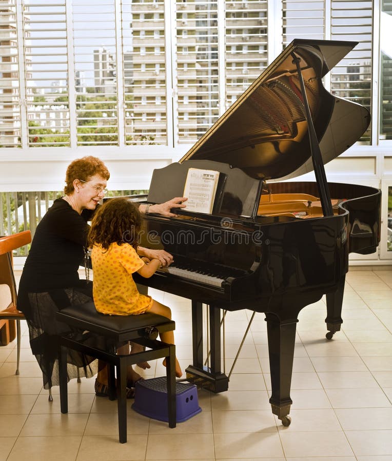 The piano teacher stock image. Image of older, music, learning - 6582603