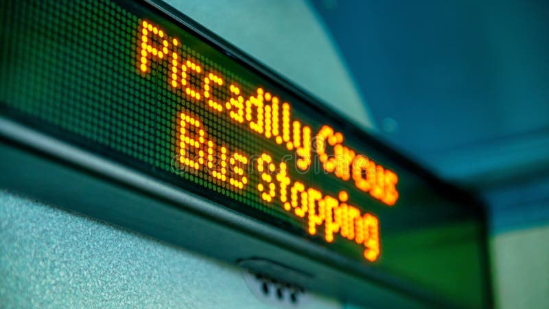Piccadilly Circus Bus Stopping in London Stock Image - Image of ...