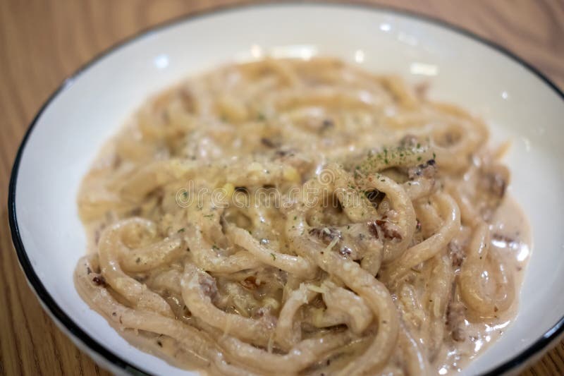 Pici cream served on plate stock photo. Image of texture - 385742562