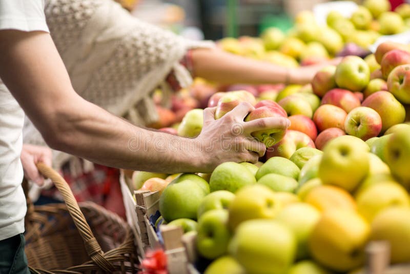 Pick apple in the market stock image. Image of close - 90678329