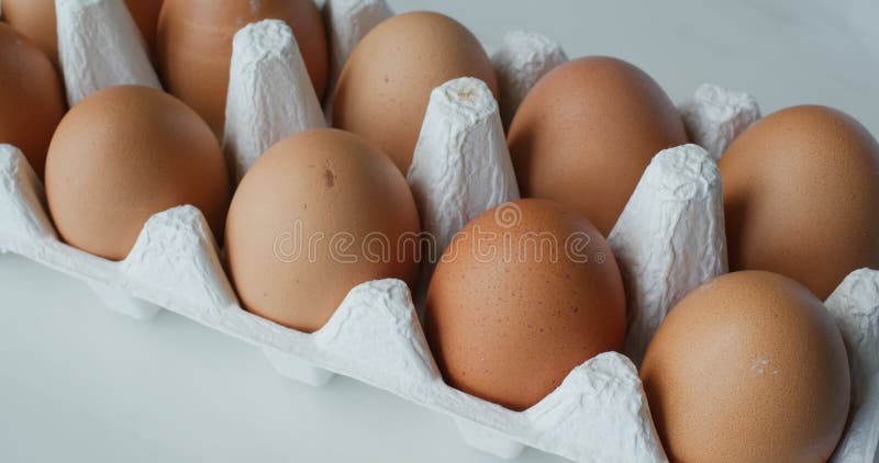 Pick egg from package stock image. Image of yellow, ingredient - 188650235