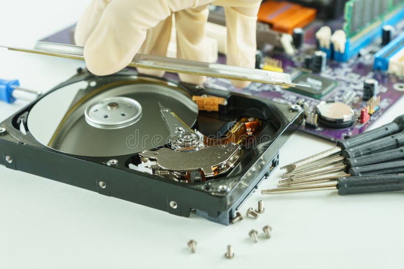 Pick Up and Open Hard Disk Drive for Repair Inside Stock Photo - Image ...