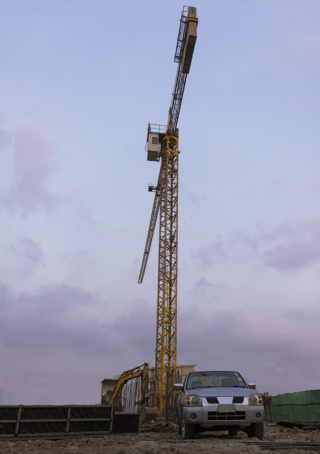 A Pick Up Truck and Crane in Construction Site Stock Image - Image of ...