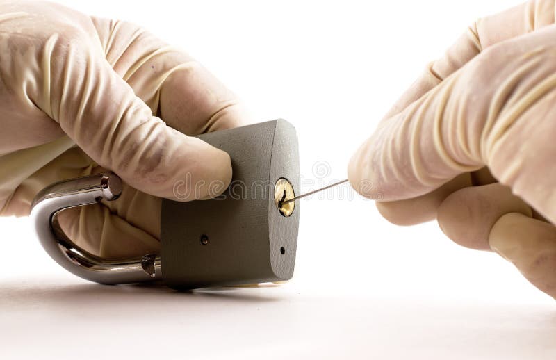 Picking a Grey Metal Padlock Stock Photo - Image of hands, opening ...