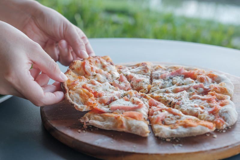 Picking a pizza stock image. Image of hand, cheese, recommend - 194288389