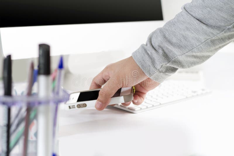 Picking Up Phone from Computer Table. Stock Image - Image of filled ...