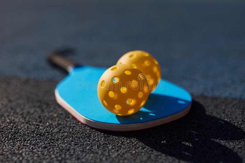 Pickleball Racket and Balls on Court Stock Image - Image of pickleball ...