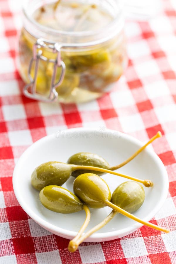Pickled caper berries. stock photo. Image of eating, green - 99907928