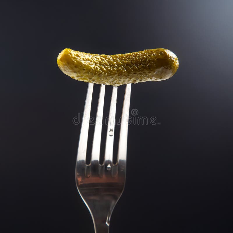 Pickled Cucumber on a Fork. Food and Vegetables Stock Photo - Image of ...