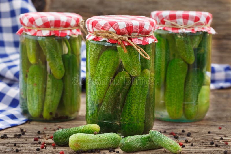 Pickled gherkins in jar stock image. Image of pickles - 80033583
