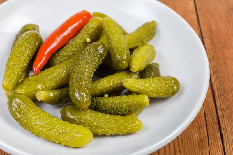 Pickled Gherkins on White Saucer, Fragment Close-up Stock Photo - Image ...