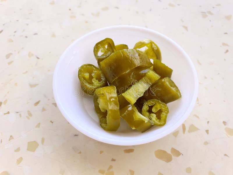 Pickled green chilies stock photo. Image of color, spicy - 265924564