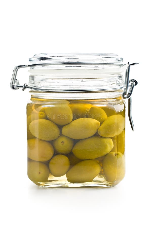 Pickled Green Olives and Olive Tree Branch on a White Stock Image ...