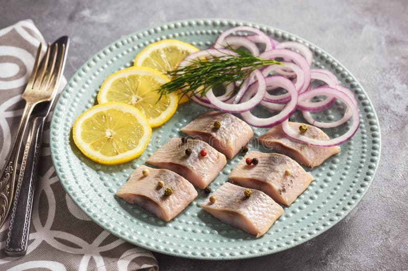 Pickled Herring with Red Onion and Lemon Slices. Stock Image - Image of ...