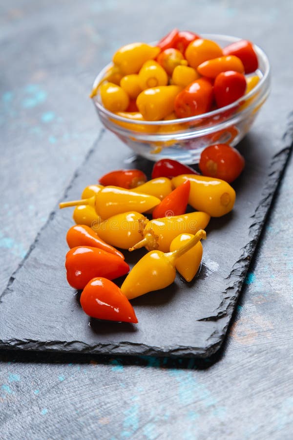 Pickled hot chili peppers stock image. Image of spicy - 239084647