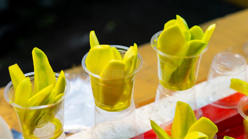 Pickled Mango in Plastic Cups. a Typical Indonesian Snack Made from ...